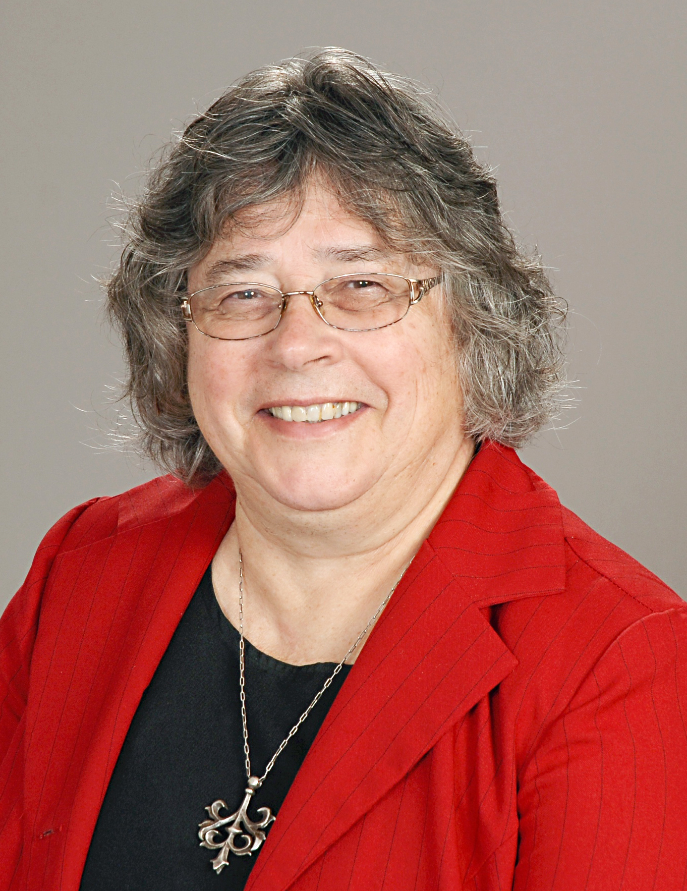 ANNE C. PERRY - Professional Women