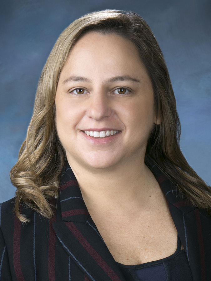 SUZANNE L. RISKIN - Professional Women