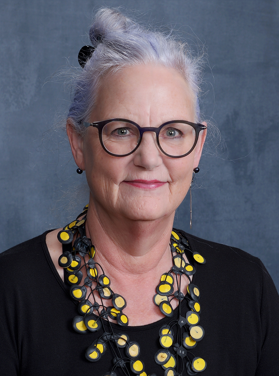 LAURA E. HILE - Professional Women