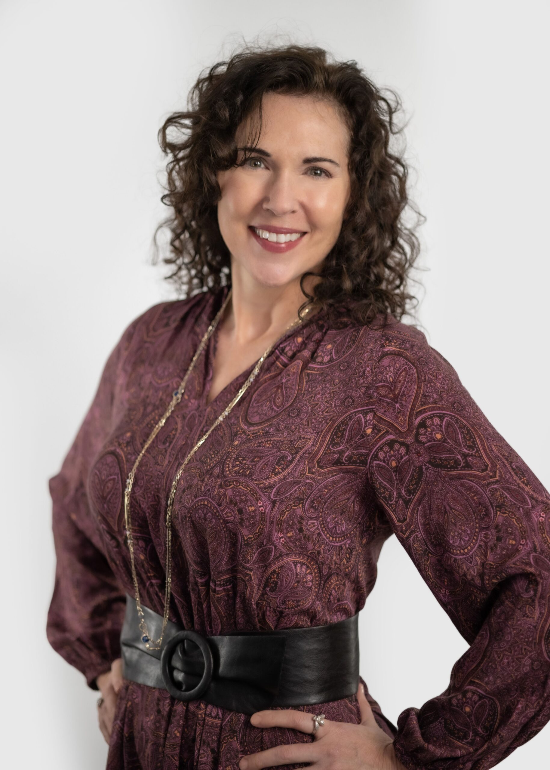 TRACY L. TEUSCHER - Professional Women