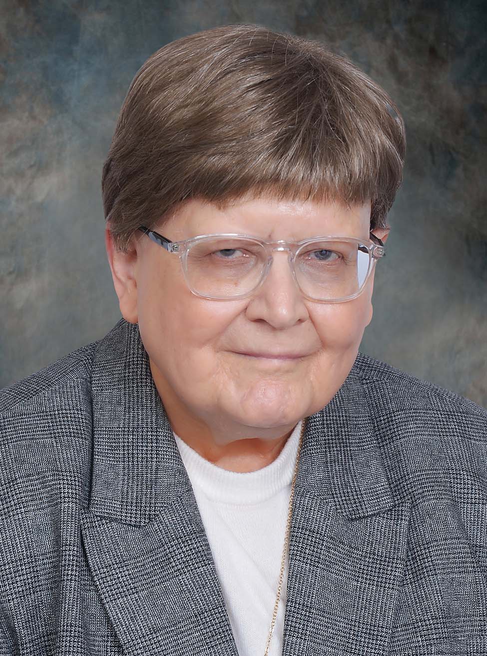 JOAN M. WOLK - Professional Women